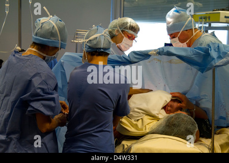 Cesarean in a hospital.a newborn in operating room Stock Photo - Alamy