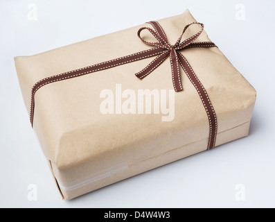 Tied brown blank plastic packet isolated on white background Stock ...