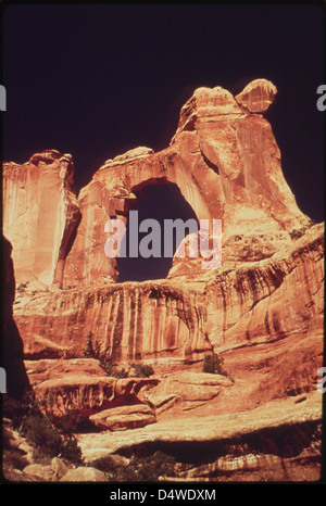A photograph from May 1972 captures the Double Arch in the Windows ...