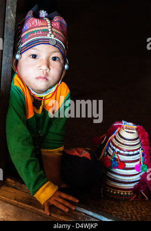 Ethnic Akha children wearing traditional clothes in tribal village near ...