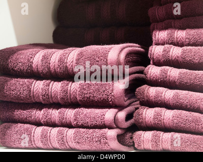 Bath towels lined up on the table, macro shot background Stock Photo ...