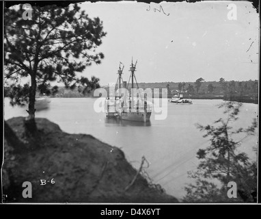 This photograph by Mathew Brady shows the ironclad warship USS Onondaga ...