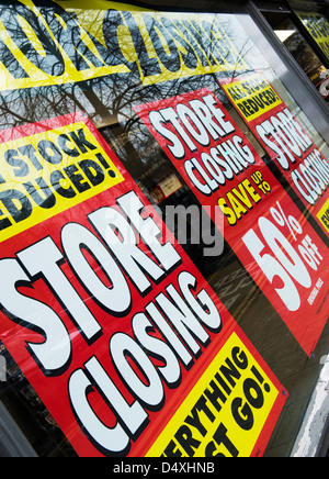 Store closing posters in the window of the Woolworths store in Redditch ...
