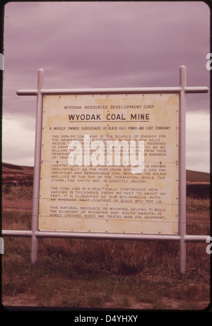 In June 1973, a power plant was under construction next to spoil piles ...