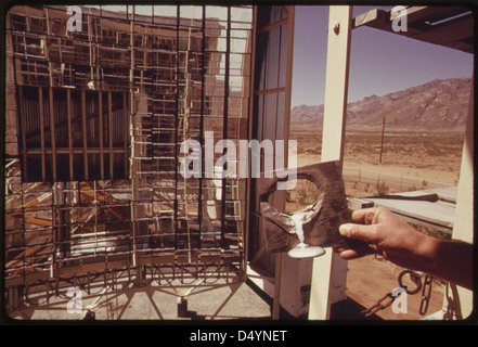 ONE QUARTER INCH THICK ALUMINUM PLATE MELTED BY THE SUN'S RAYS IN THE ...