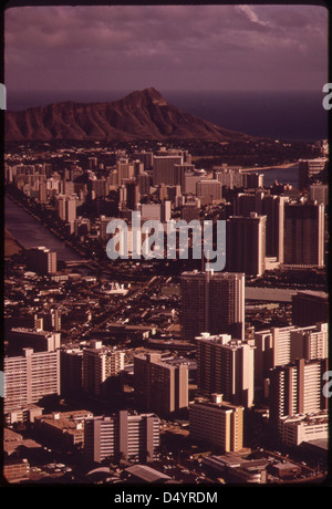 This aerial photograph of Honolulu, Hawaii, shows the Iolani Palace and ...