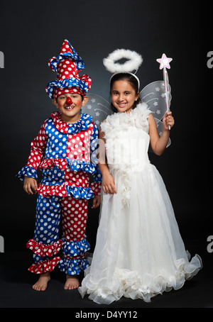 Boy imitating like a clown and girl imitating like a fairy Stock Photo ...