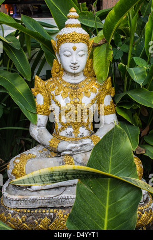 Sitting deva statue Stock Photo - Alamy