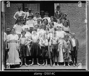 This photograph from 1912 by Lewis Hine shows child laborers working at ...