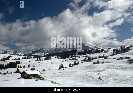 Compatsch, Italy, overlooking the snow-covered valley of the Seiser Alm ...