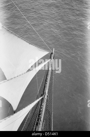 A photograph showing the view from the bowsprit of a sailing ship. The ...