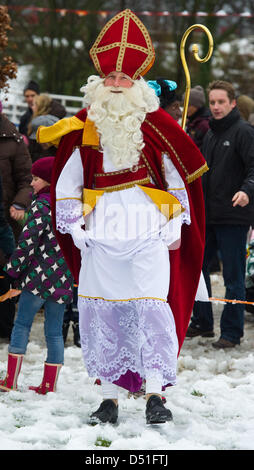 The Dutch version of Santa Claus, Sinterklaas, stands on the christmas ...