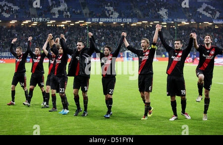 The German team celebrate after the end of the World Cup Group E soccer ...