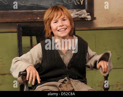 Actor Leon Seidel (Huckleberry Finn) poses for photographers during a ...