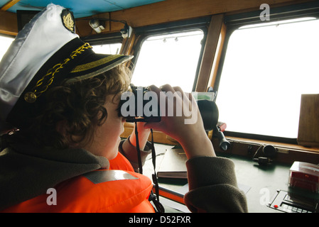 Boy playing captain, cockpit Stock Photo - Alamy