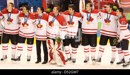 The players of Canada celebrate with their gold medals during Mens' Ice ...
