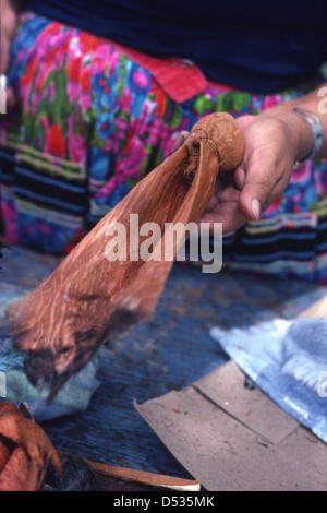 Mary Billie, a Seminole artist, is shown making a Seminole doll at the ...