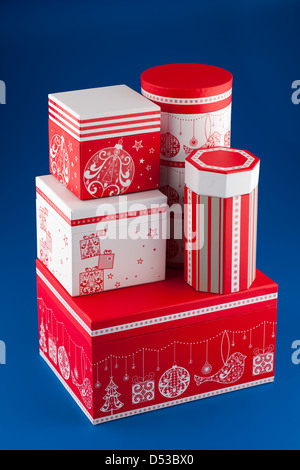 Assorted white gift boxes on red background. Copy space Stock Photo - Alamy