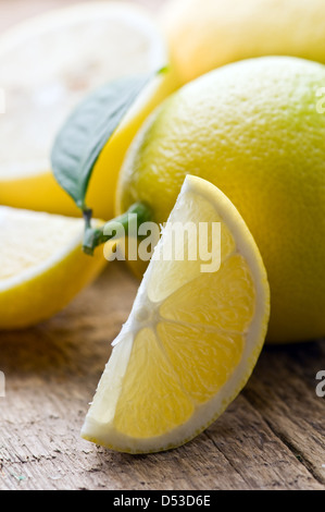 lemons on wood table Stock Photo - Alamy