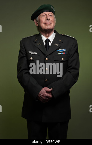 US military general wearing beret. Salutation. Studio portrait Stock ...
