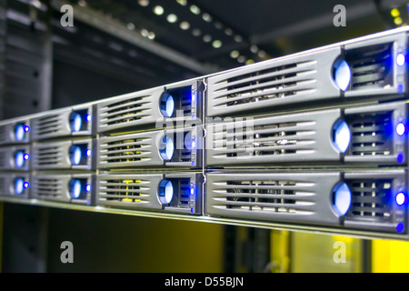 Network Server Rack Panel with hard disks in a data center Stock Photo ...