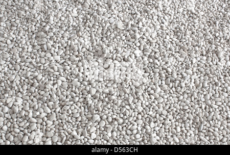 White pebble on the small garden ground inside the house. Background of ...