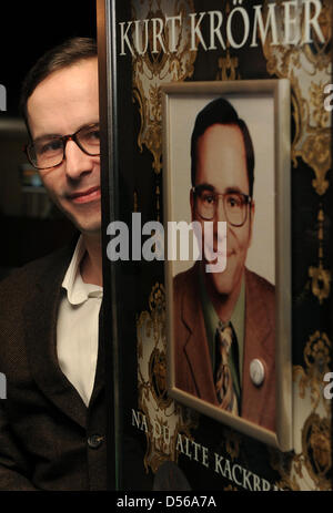 German comedian Kurt Kroemer poses with his platinum DVD of the ...