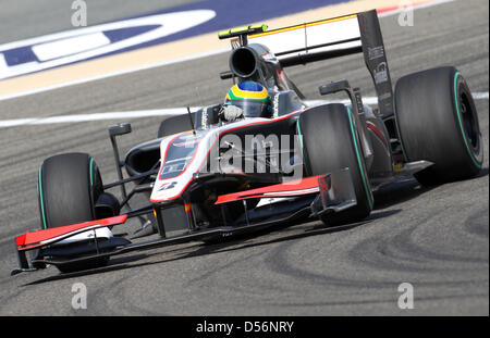 Indian Formula One driver Karun Chandhok of Lotus leaves the car after ...