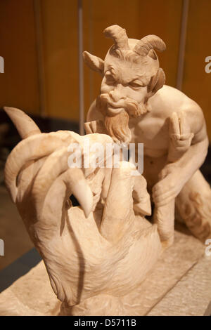 This Roman statue of Pan with a goat, from the villa of the Papyri in ...