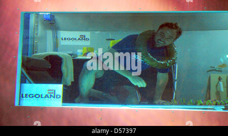 Lloyd Godson sits in his container house in Legoland near Guenzburg ...