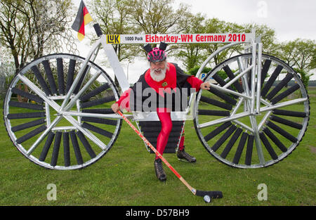 Bike designer Dieter (Didi) Senft presents a huge mobile guitar in ...