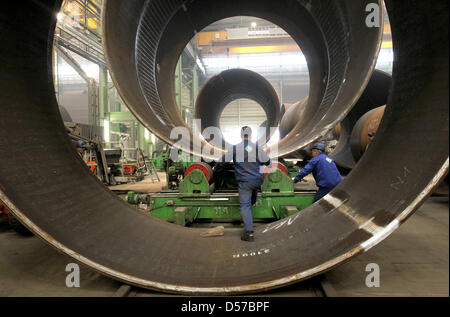 Staff members of EEW Special Pipe Conmstructions weld segments for an ...