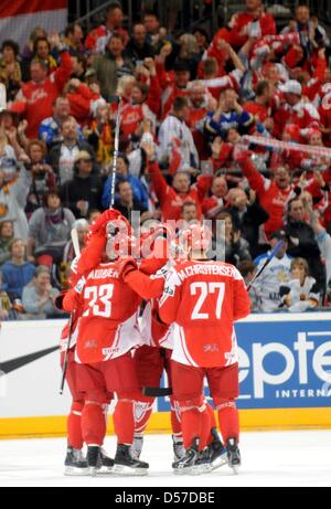 Denmark's players celebrate their goal in the Women's World Floorball ...