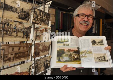 Vincent Kaufmann, collector of historical postcards, in his shop in ...