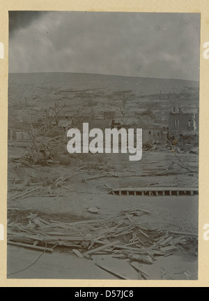 This photograph captures the eruption of Mt. Pelee in 1902, with a ...