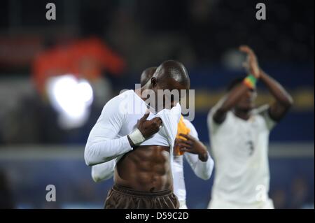 Ghana's goalkeeper Richard Kingson shows off his six pack after the ...