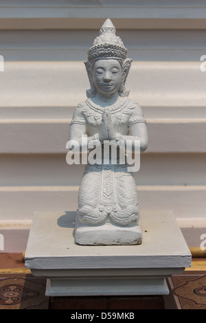 Sitting deva statue Stock Photo - Alamy