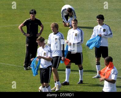 German headcoach Joachim Loew watches his players during a training ...