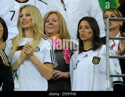 Daniela Loew (2nd L), the wife of German headcoach Joachim Loew, Sarah ...