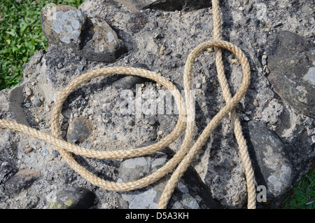Natural hemp rope, hemp fiber woven into a thick thread closeup ...