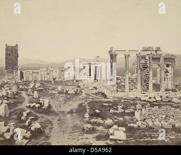Ancient Greek Acropolis Propylaea in Athens lit up at night, showcasing ...