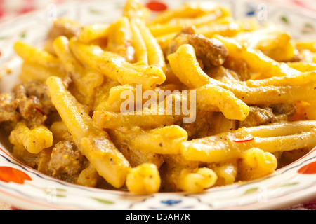 Strozzapreti alla pastora classic Italian pasta and pork dish Stock ...