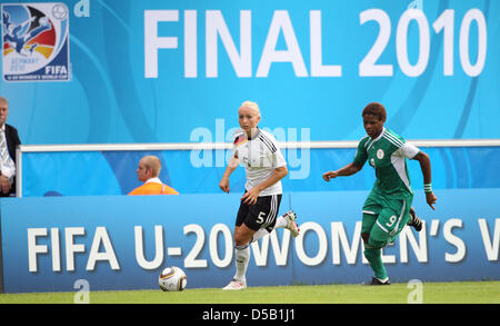 Germany's Kristina Gessat (R) fights for the ball with Nigeria's Esther ...