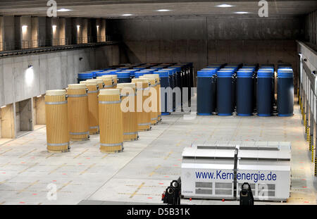 Containers with highly radioactive waste (back) and transportation ...