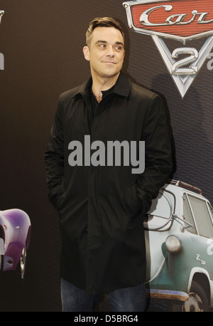 Robbie Williams at the premiere of 'Cars 2' at Mathaeser Filmpalast ...
