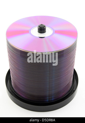 spindle of dvds isolated on a white background Stock Photo - Alamy