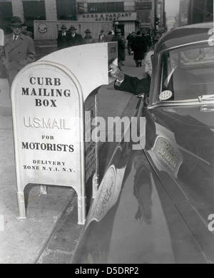 A photograph of a Snorkel Chute curbside mailbox, located in New York ...