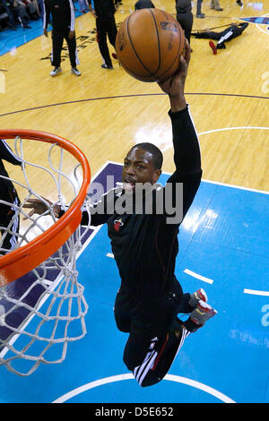 Dwyane Wade (3) of the Miami Heat dunks in overtime in Game 2 of the ...