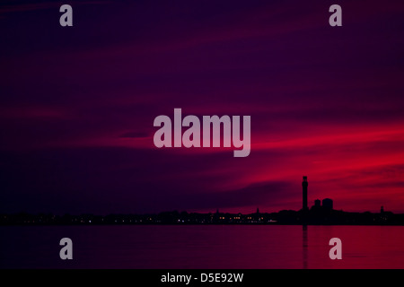 Sunset over the sea and town of Provincetown Stock Photo - Alamy