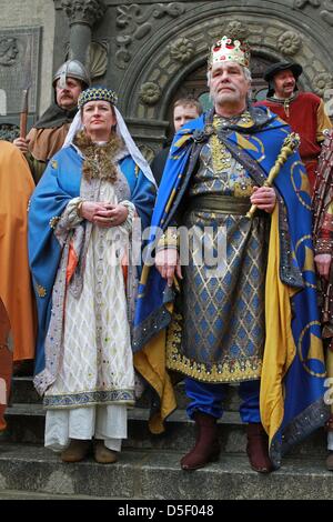 People dressed as German kings take part in an Easter procession ...